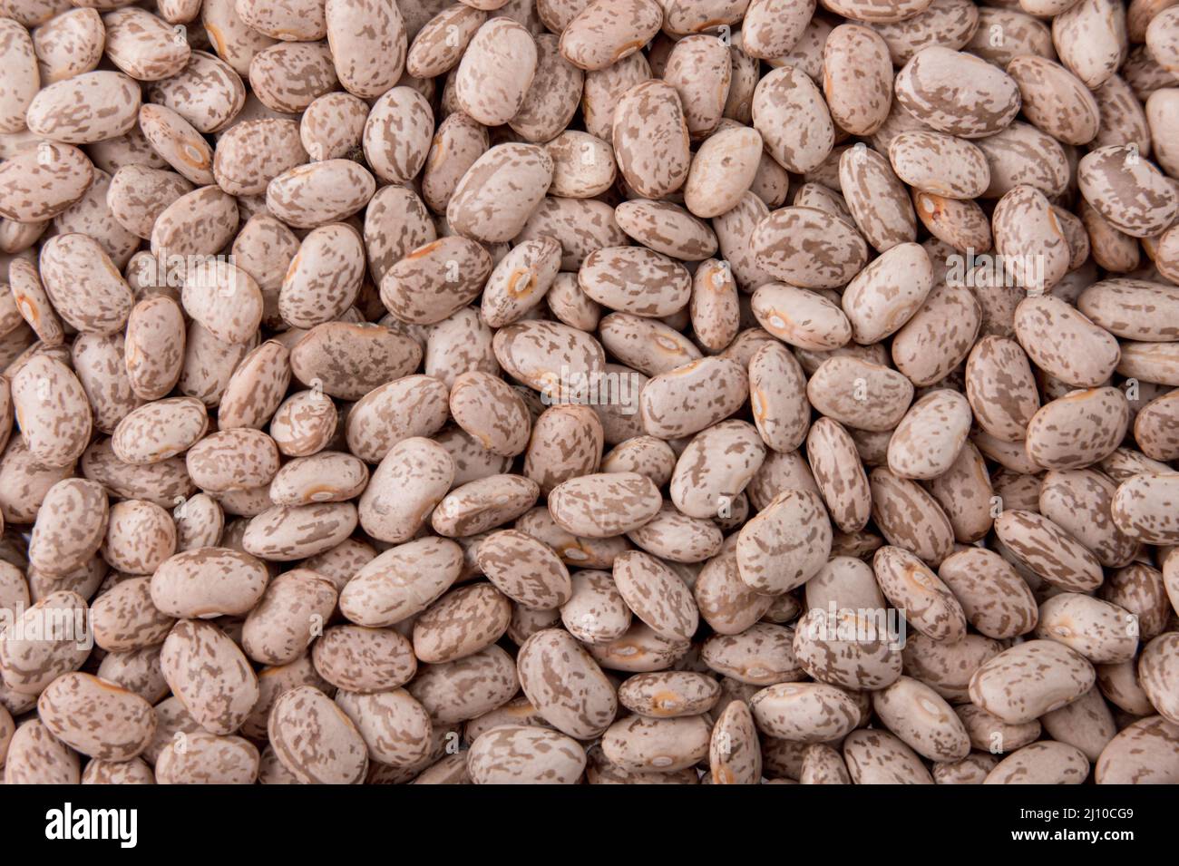 The photo shows red beans. The texture of the seeds is made in high ...