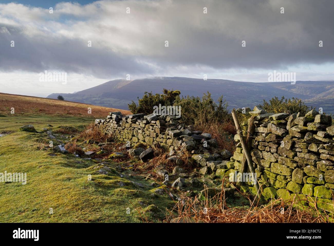 Crumbling stone wall in the South Wales Mountains Stock Photo - Alamy