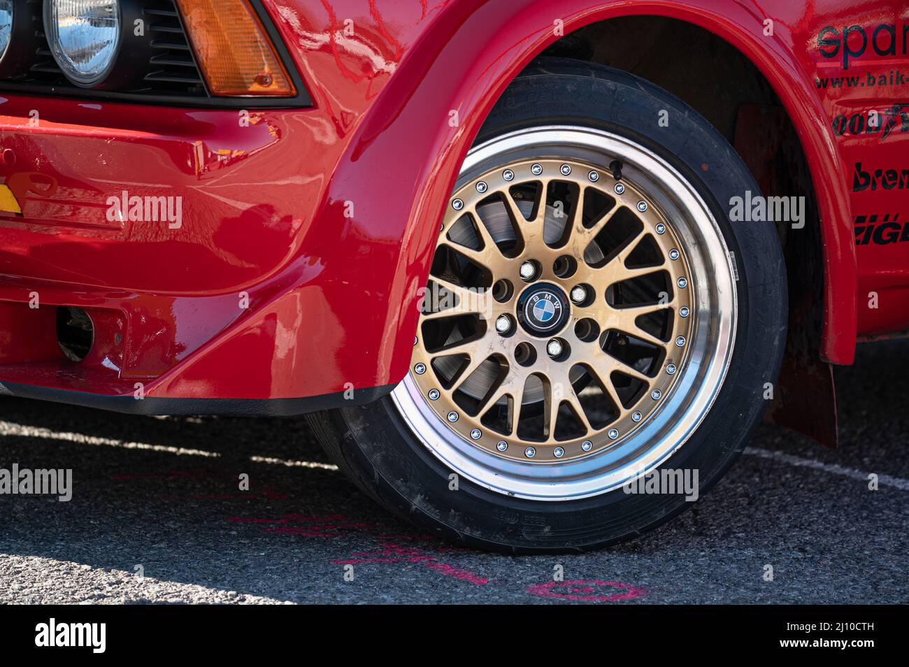 Closeup of the front wheel of the classic BMW E21 at the 2 Rally Sprint ...