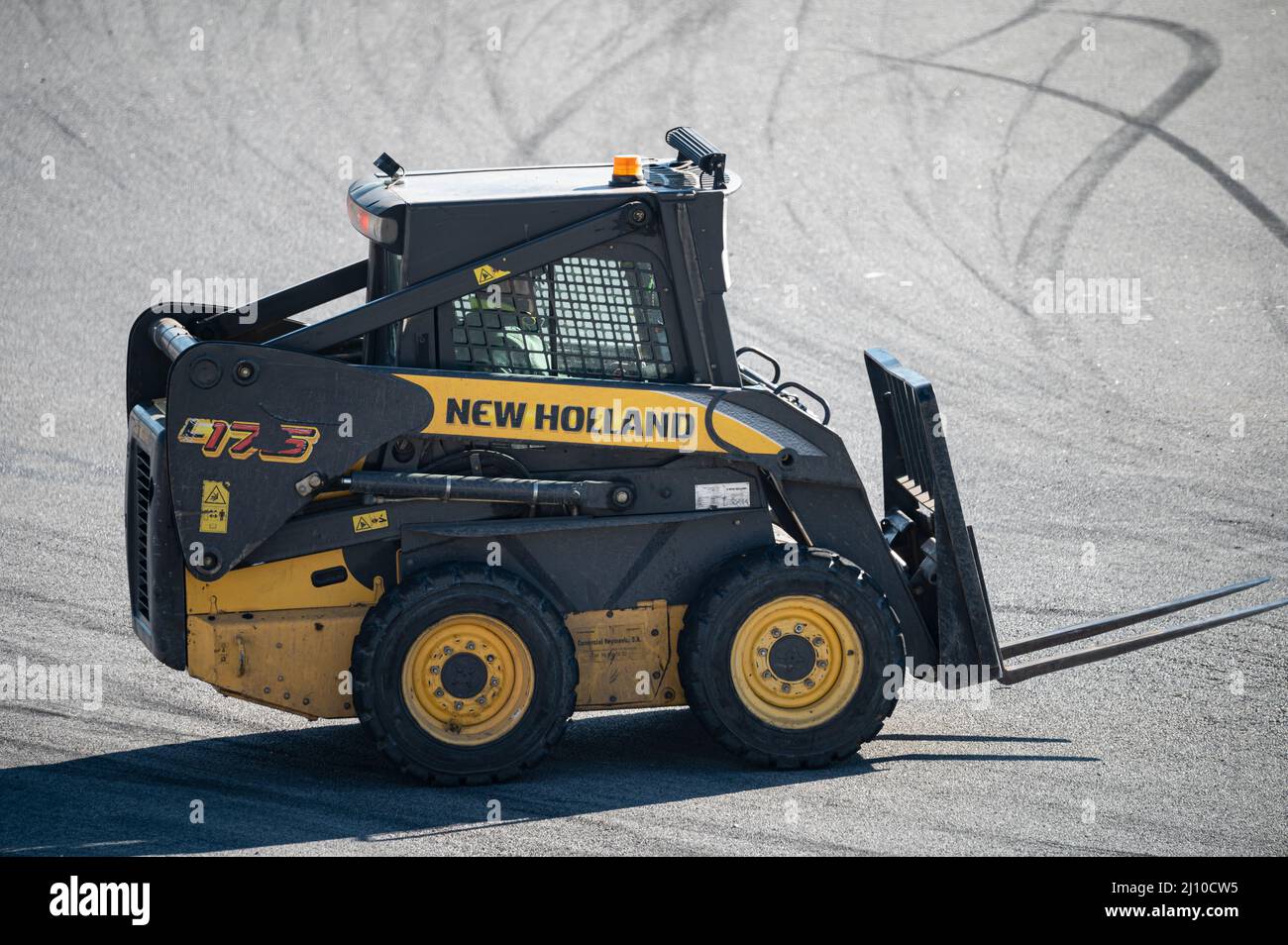 Closeup of a New Holland skid steer loader model L175 Stock Photo - Alamy