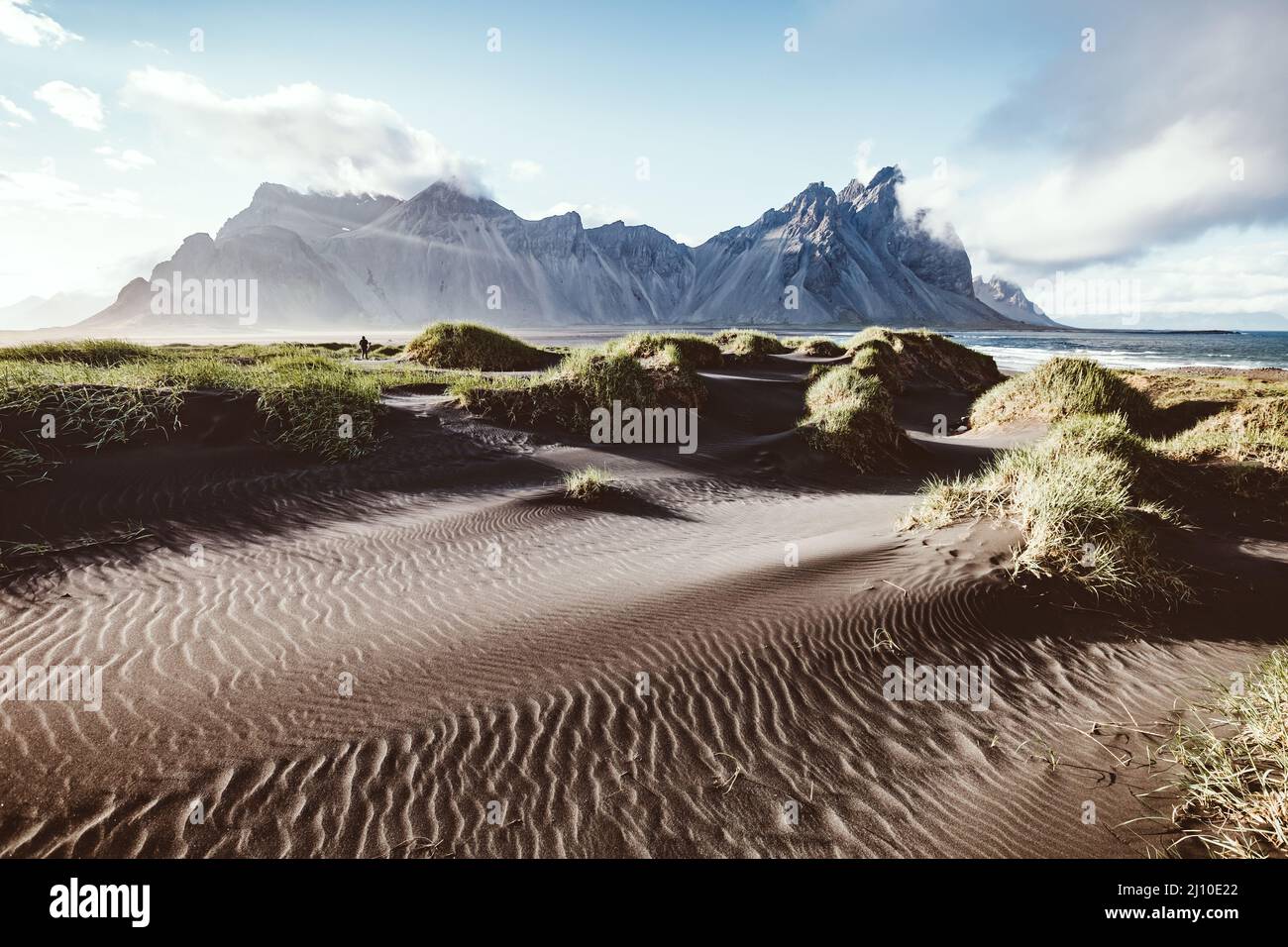 Unusual hills glowing by sunlight. Dramatic and gorgeous scene. Tourist ...