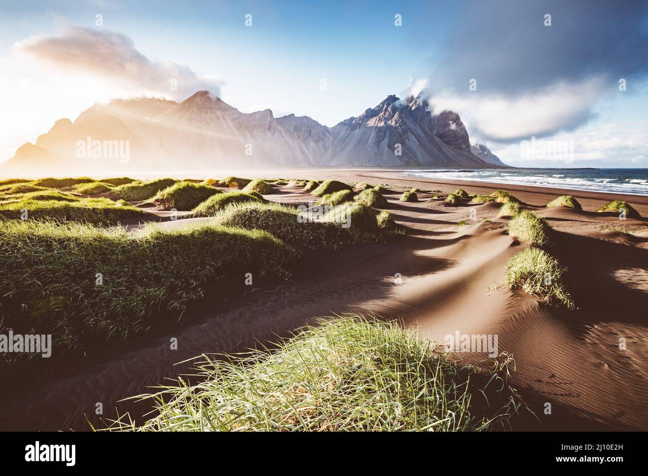 Unusual hills glowing by sunlight. Dramatic and gorgeous scene. Tourist ...