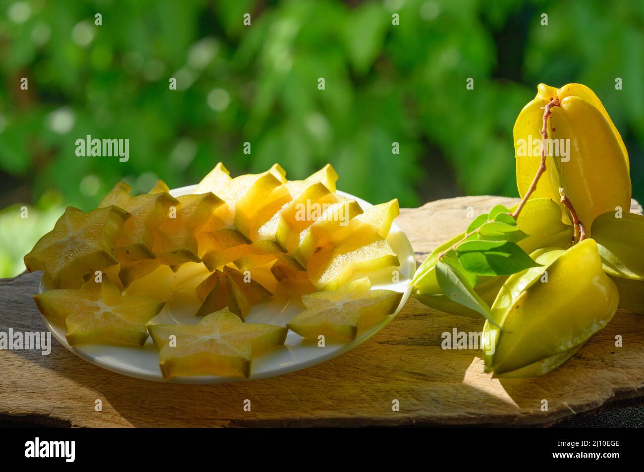 Photo shows an exotic fruit - carambola. Yellow star fruit is presented ...