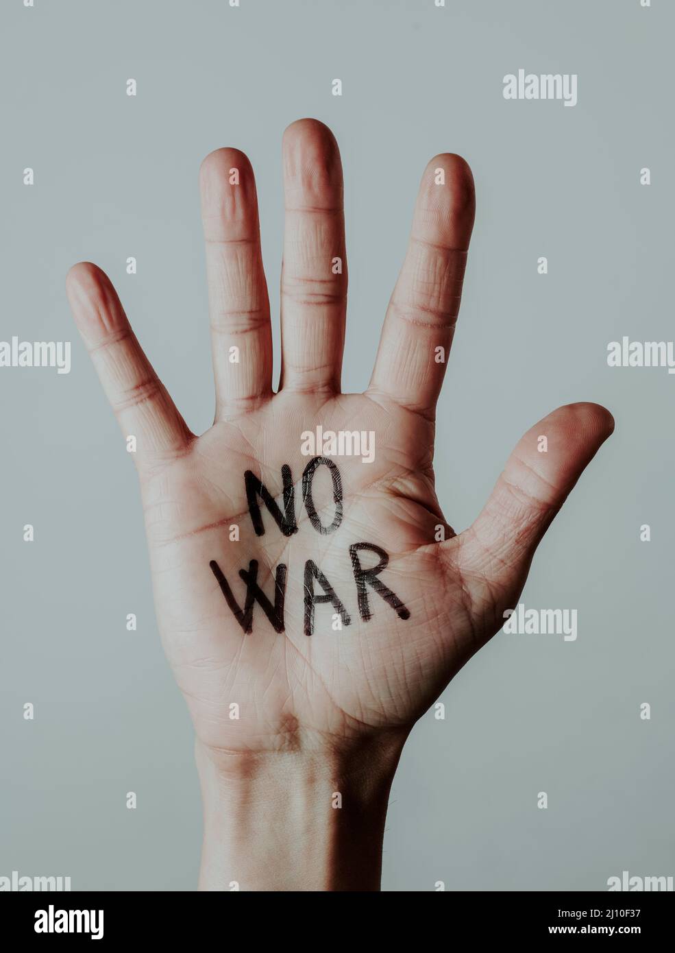 Stop written on hand hi-res stock photography and images - Alamy