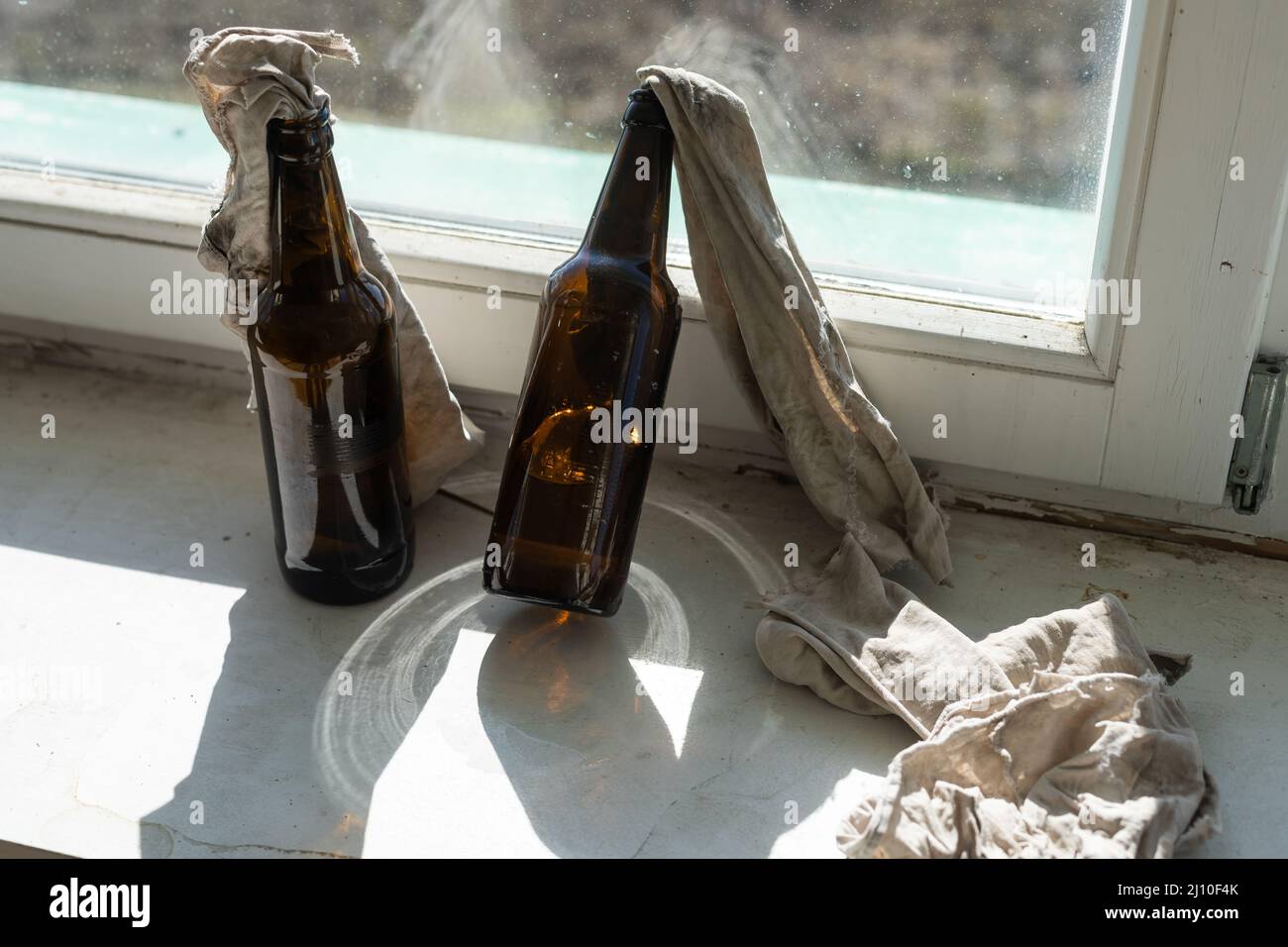 Glass bottle filled with gasoline, a so called Molotov Cocktail, on the ...