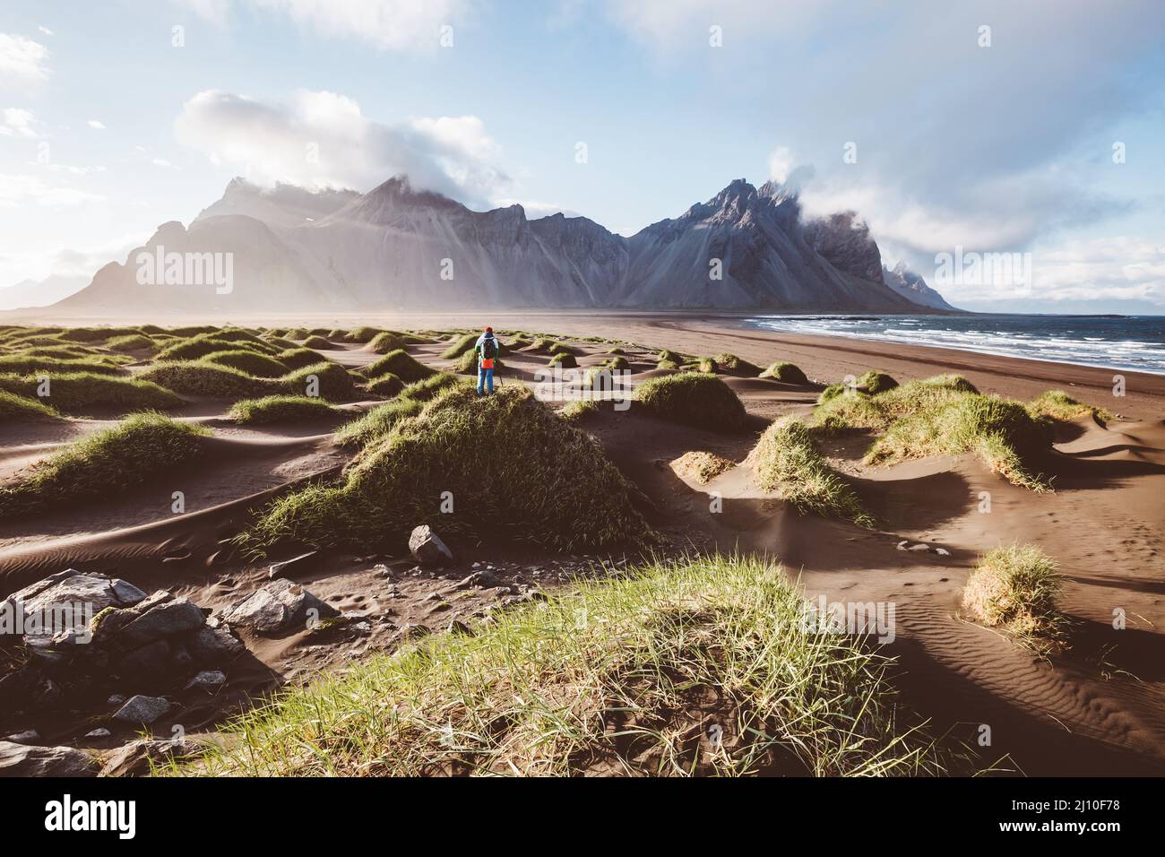 Unusual hills glowing by sunlight. Dramatic and gorgeous scene. Tourist ...