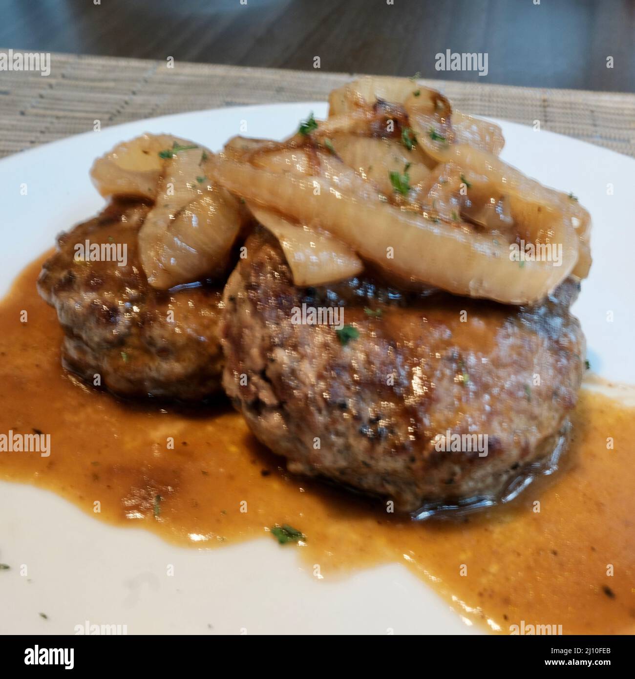 Hamburger Beef Patties with Fried Onions and Gravy Sauce Stock Photo ...