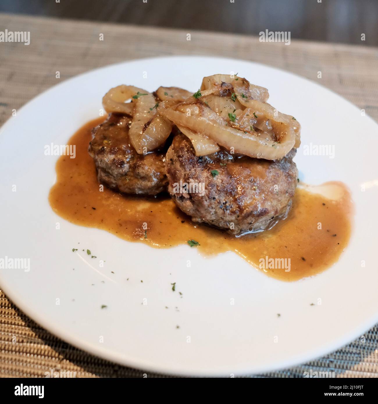 Hamburger Beef Patties with Fried Onions and Gravy Sauce Stock Photo ...