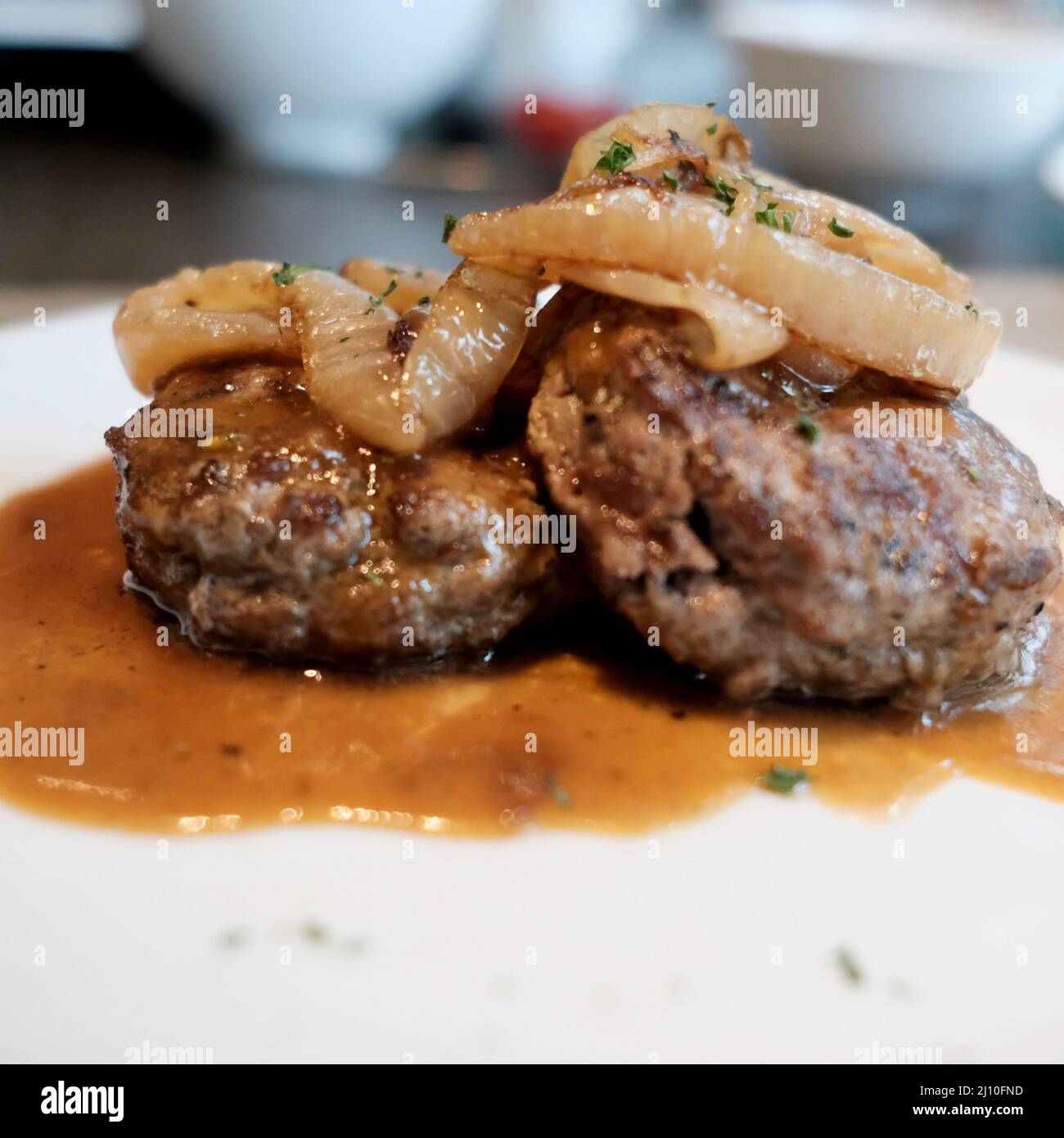 Hamburger Beef Patties with Fried Onions and Gravy Sauce Stock Photo ...
