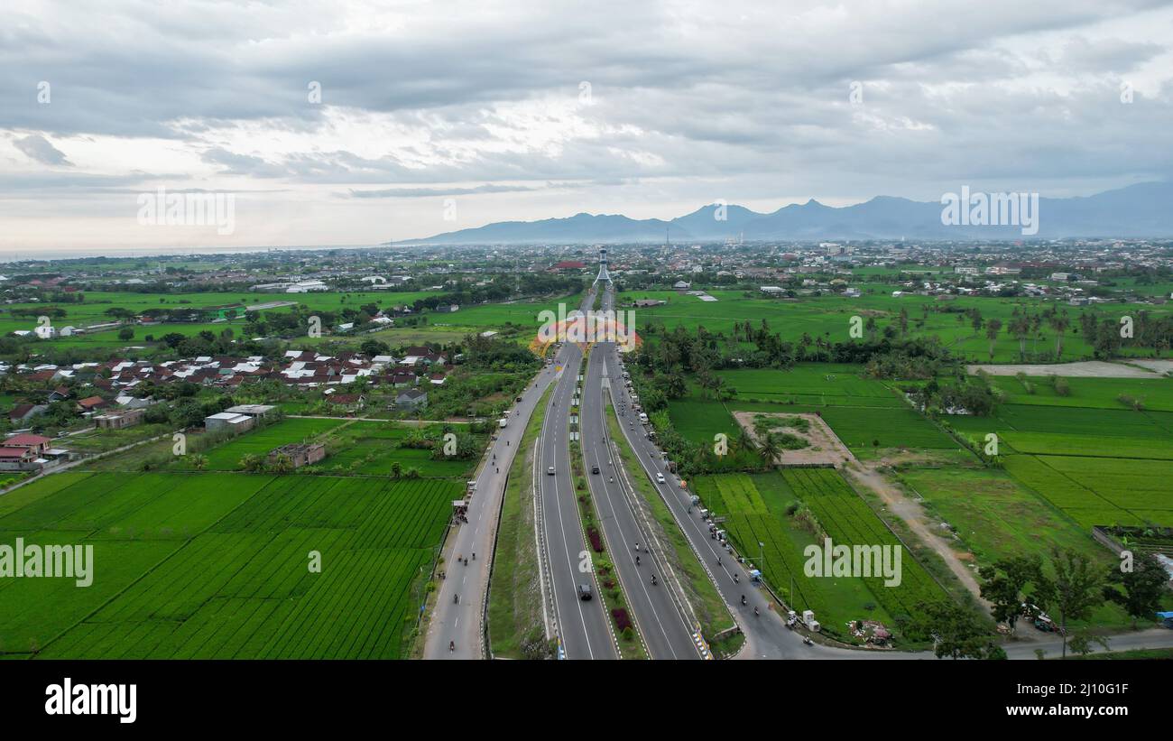 Aerial view of the city colorful Monument Tembolak Rainbow and Mataram ...