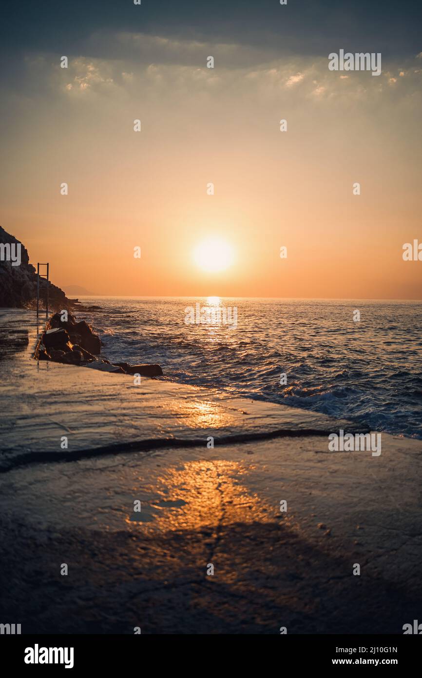 Beautiful sunset on the background of the sea. Sunset seascape ...