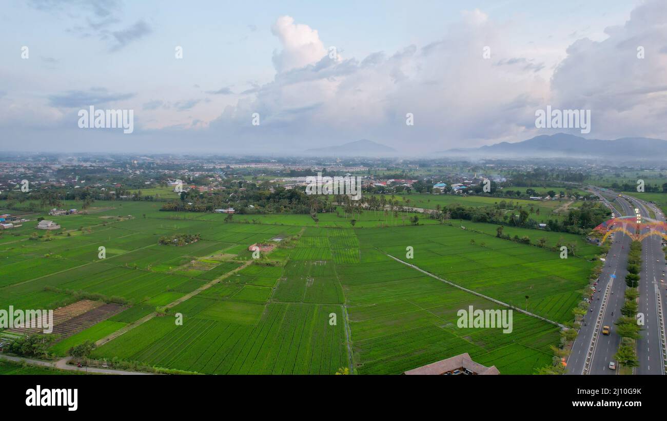 Aerial view of the city colorful Monument Tembolak Rainbow on Mataram ...