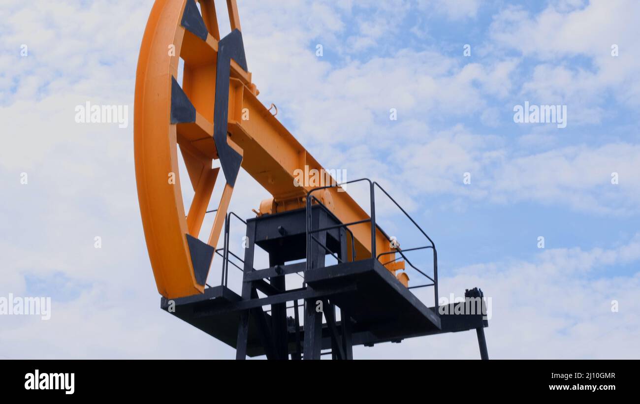 Oil rocking chair in Russia. The concept of oil production, refining ...