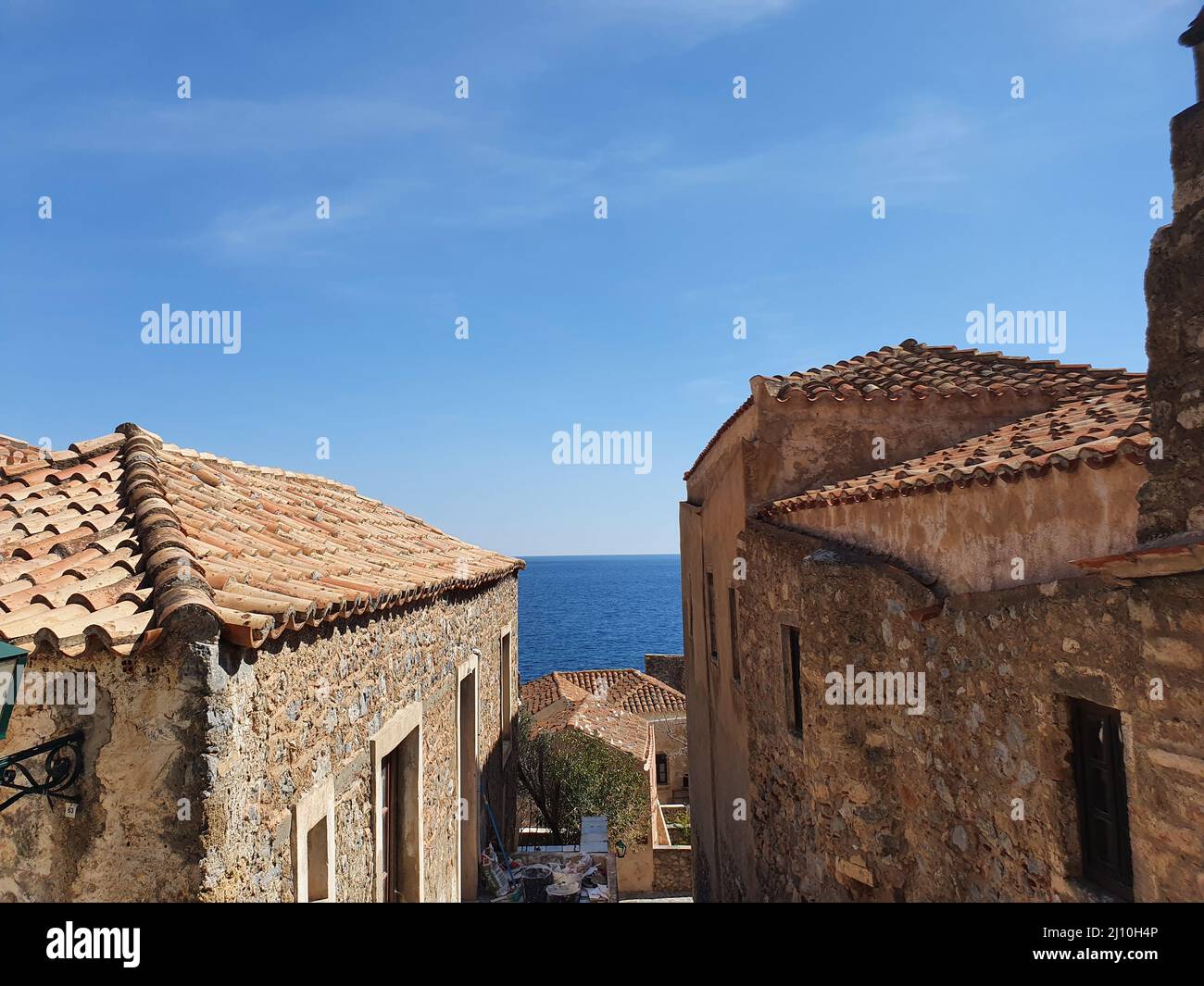 Old medieval town buildings at a sunny day under the blue clear sky ...