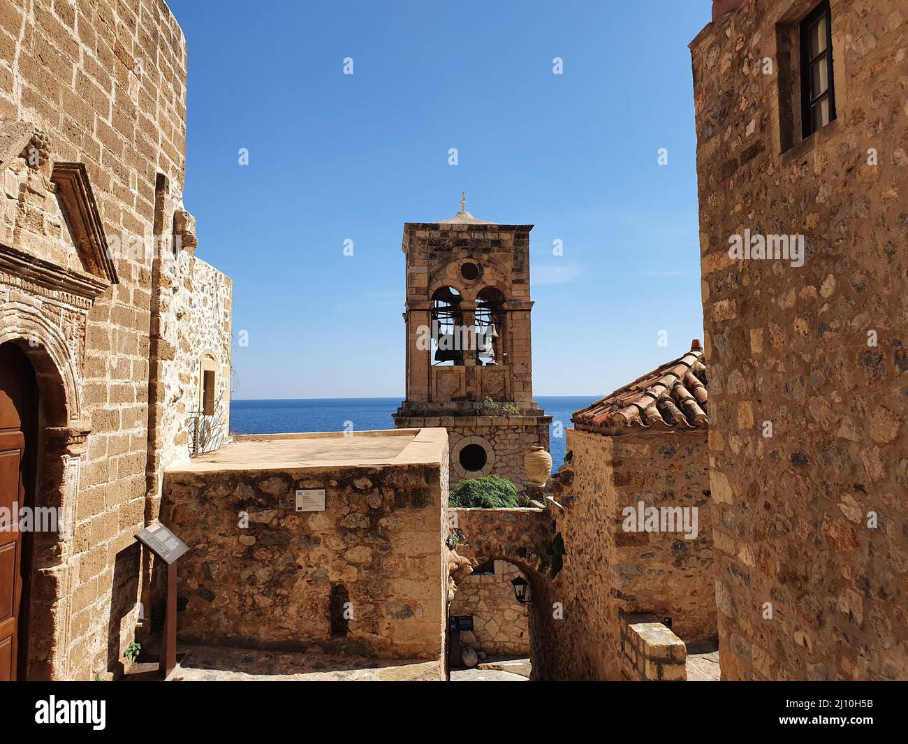 Old medieval town buildings at a sunny day under the blue clear sky ...