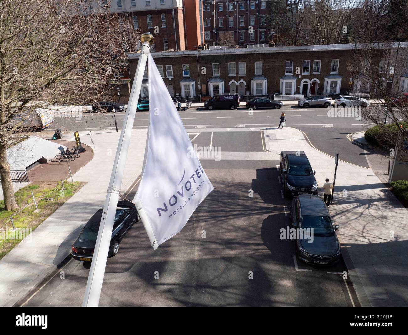 Hammersmith London, Flag above entrance of Novotel Hotel, London Stock ...