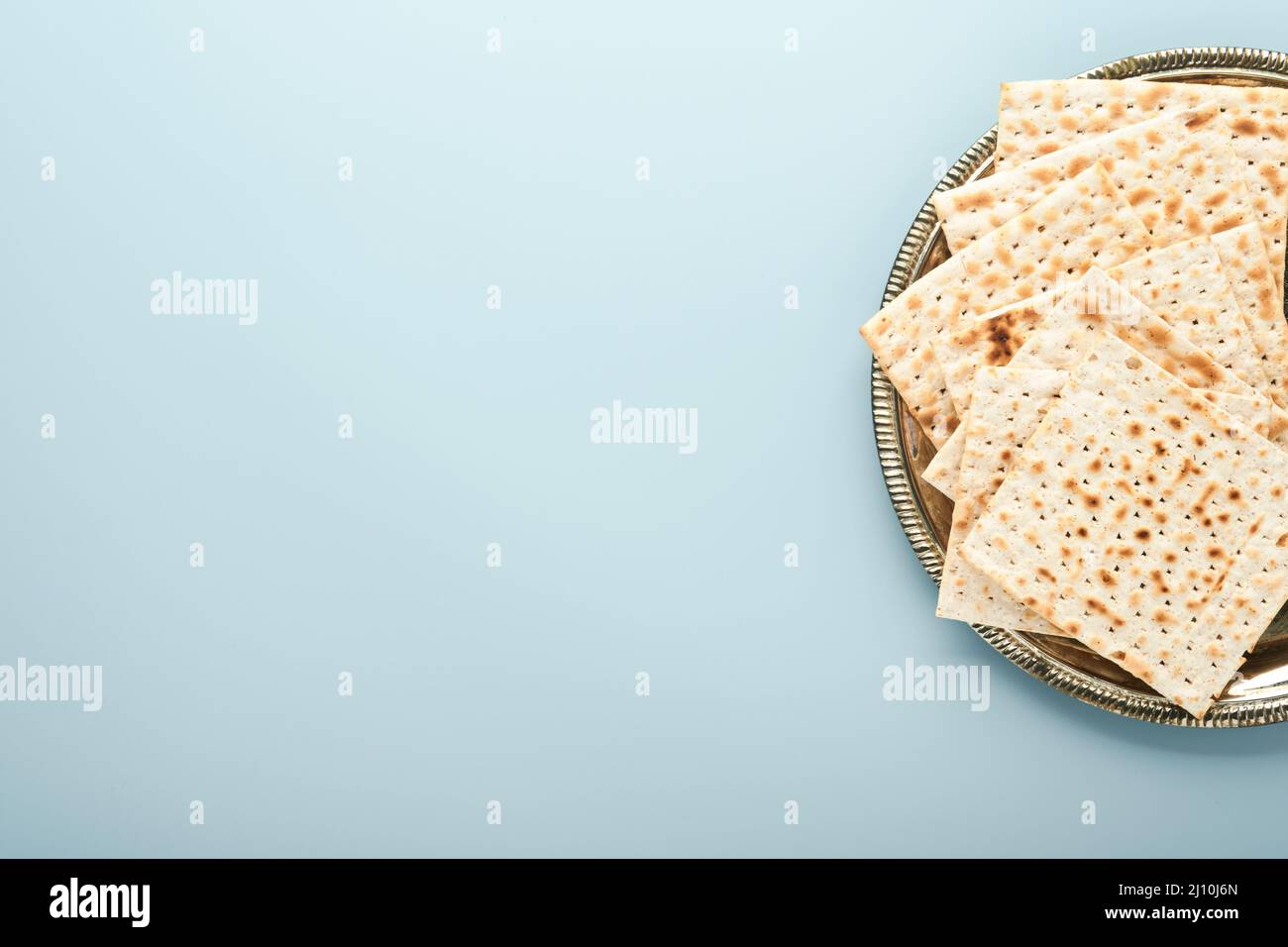 Passover celebration concept. Matzah, red kosher and walnut ...