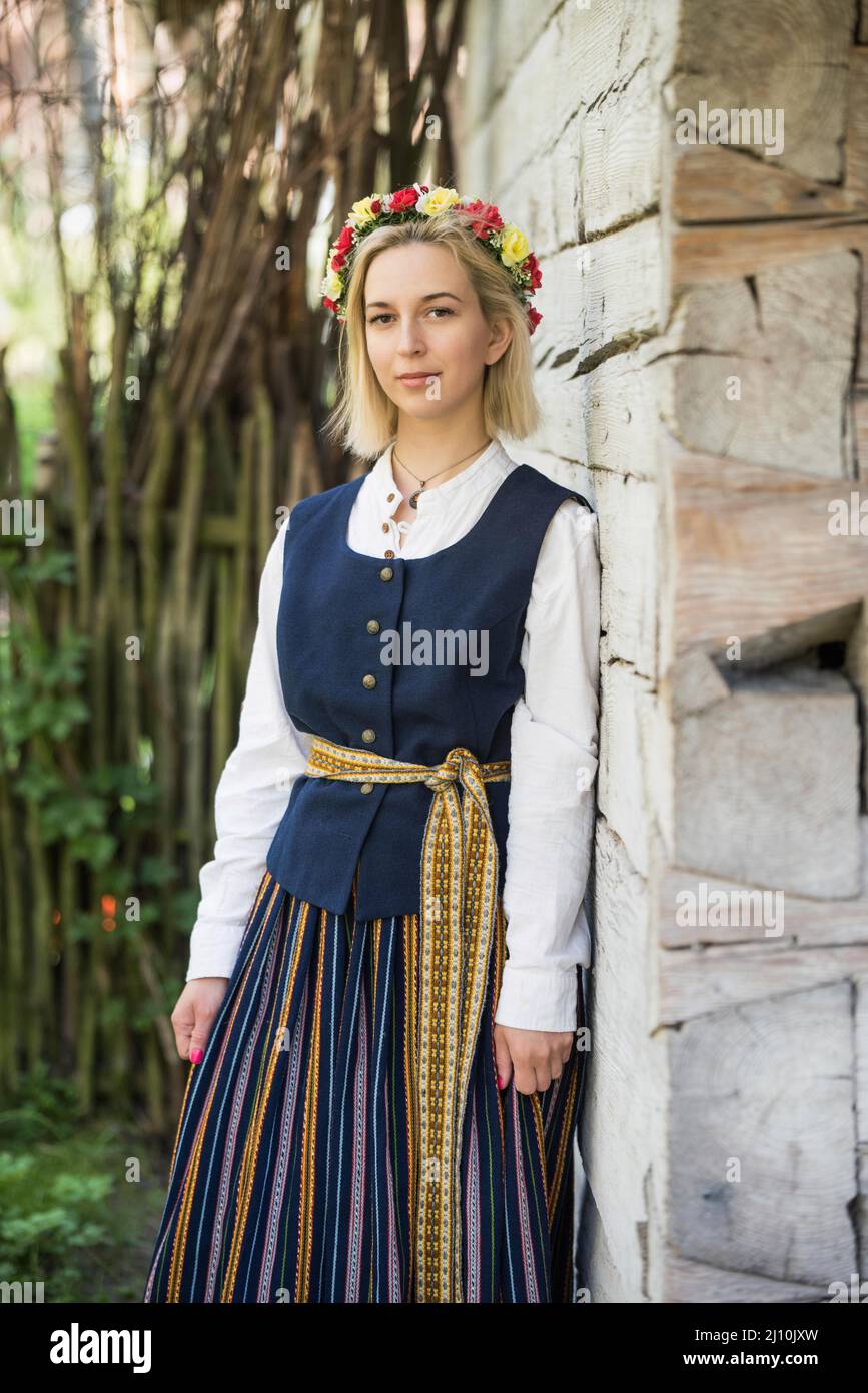 Woman in traditional clothing posing on nature in village Stock Photo ...