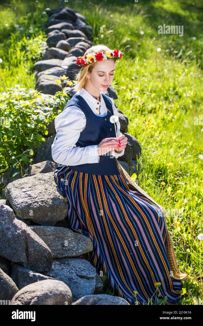 Latvian woman in traditional clothing. Ligo folk Stock Photo - Alamy