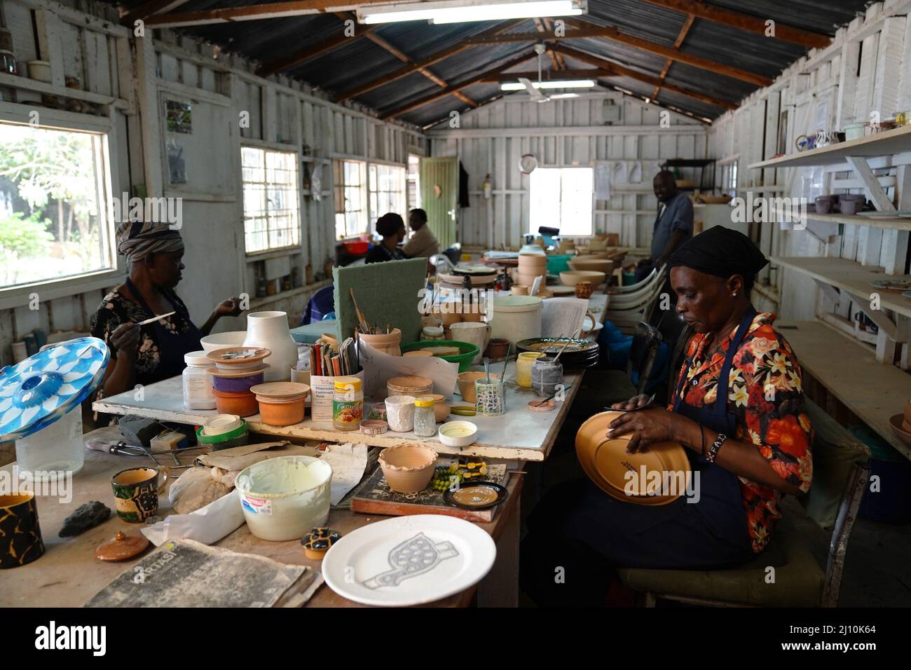 Nairobi, Kenya. 21st Mar, 2022. Women work at the Kazuri workshop in ...