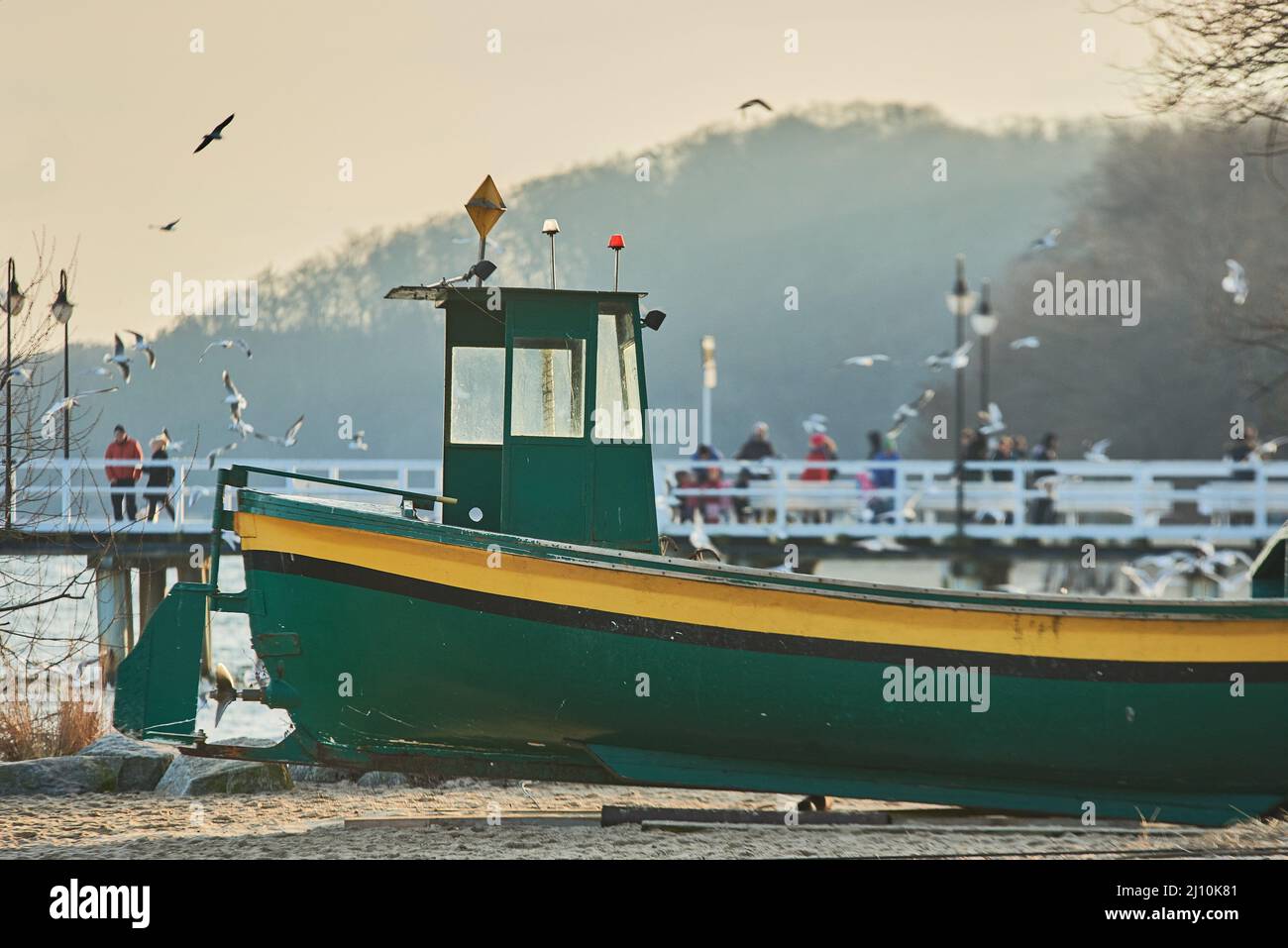 Photo of old active fishing boat on the Orlowo beach in Gdynia, Poland ...