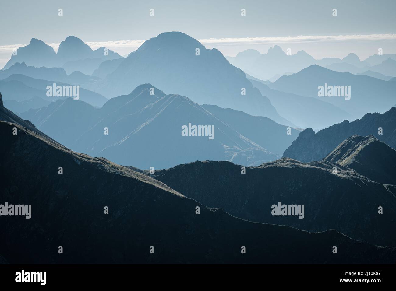 Photo of mountains in mist Stock Photo - Alamy