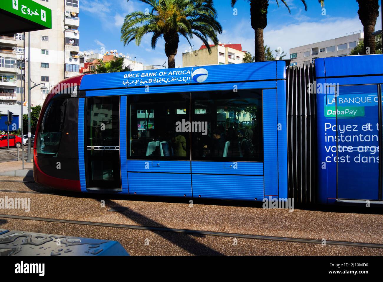 CASABLANCA, MOROCCO - NOVEMBER 20; 2018 blue modern tram leaving along ...