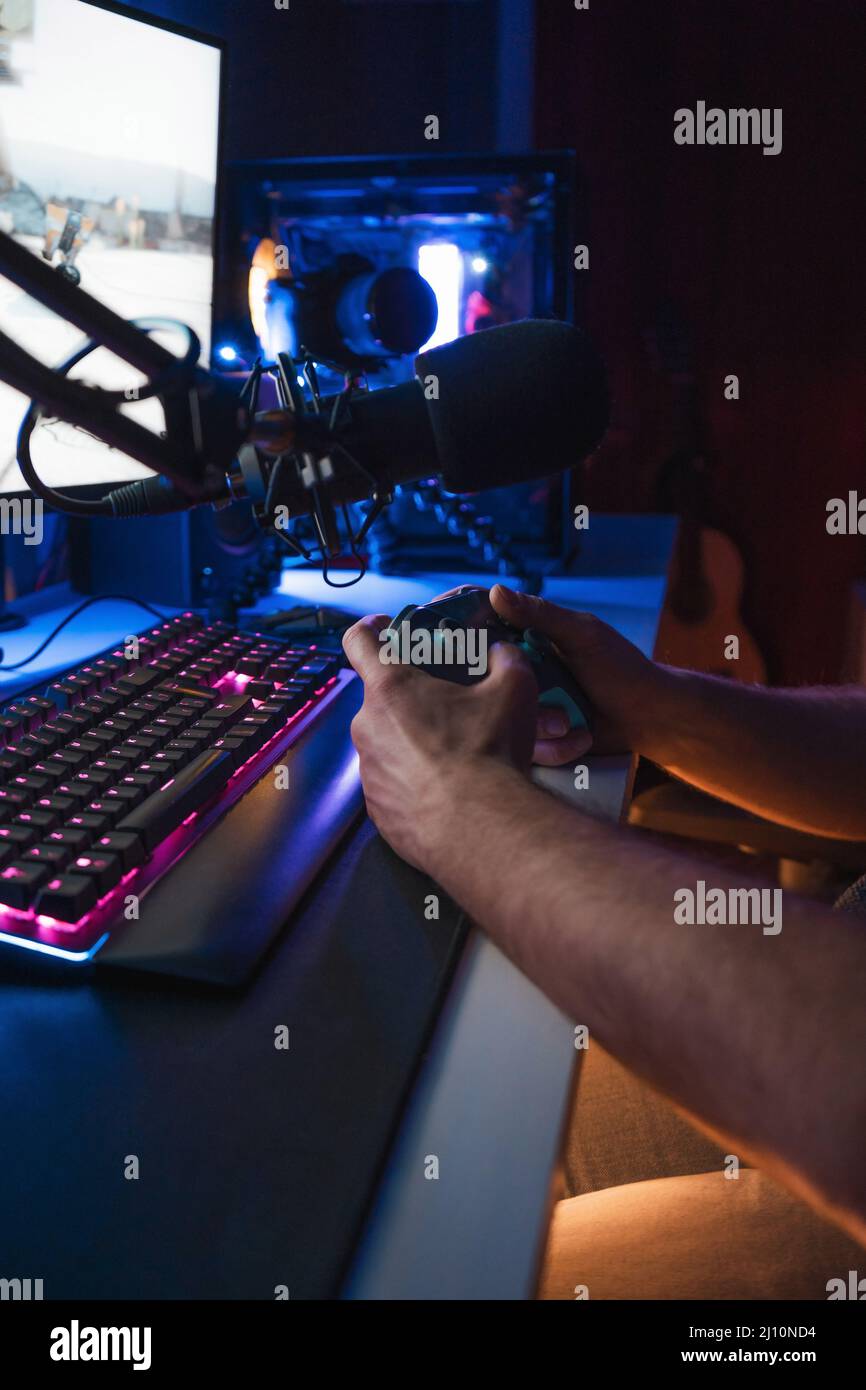 Gamer playing in his dark room Stock Photo - Alamy
