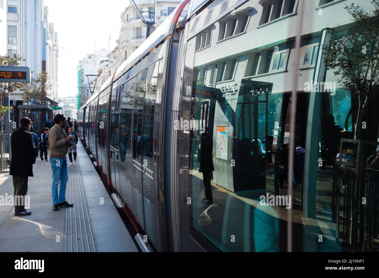 CASABLANCA, MOROCCO - NOVEMBER 20; 2018 people getting on a city centre ...