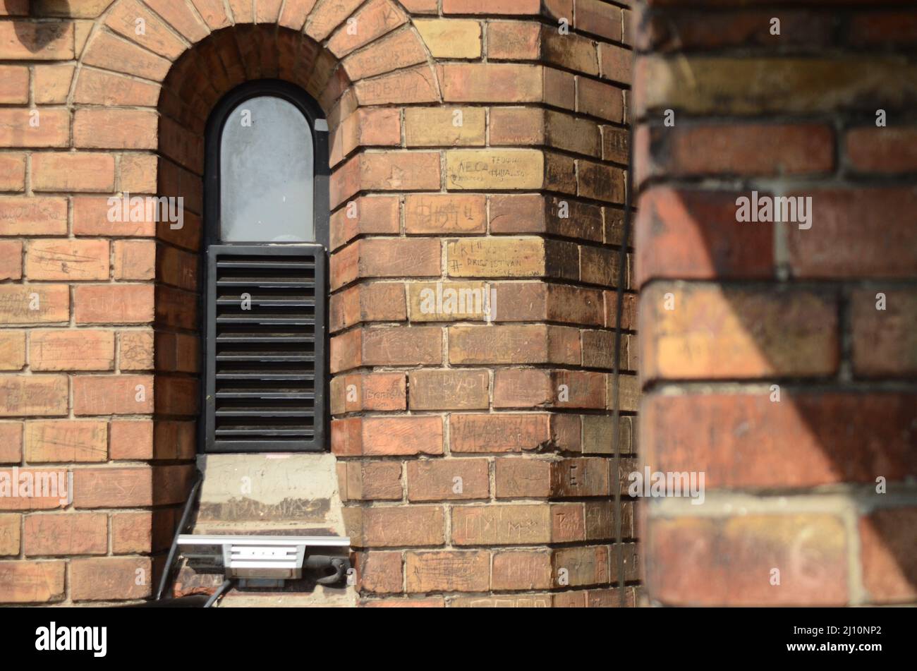Old stone building with a small window Stock Photo - Alamy