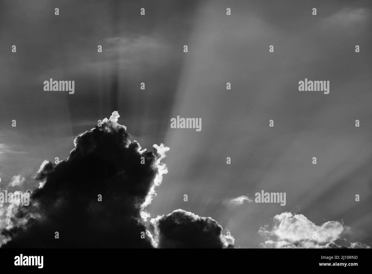 Light sun rays shining through Black and White Stock Photos & Images ...