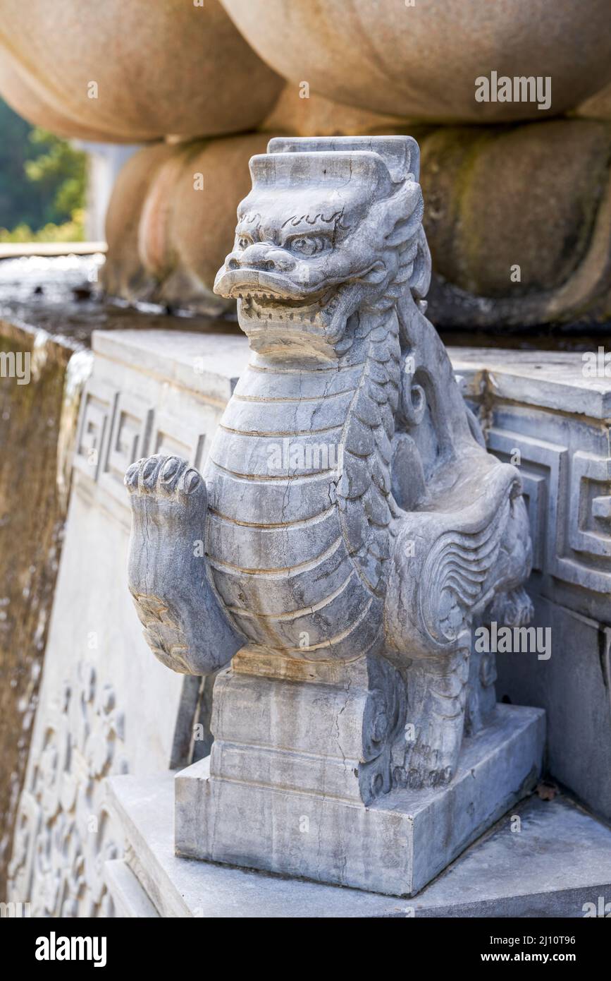 A stone statue of a traditional Chinese mythical beast unicorn Stock ...