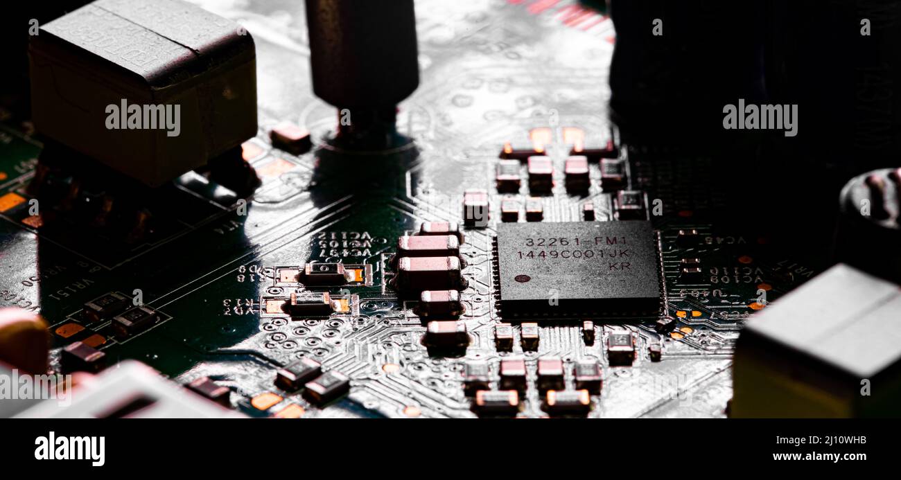 Macro Close up of components and microchips on PC circuit board of ...
