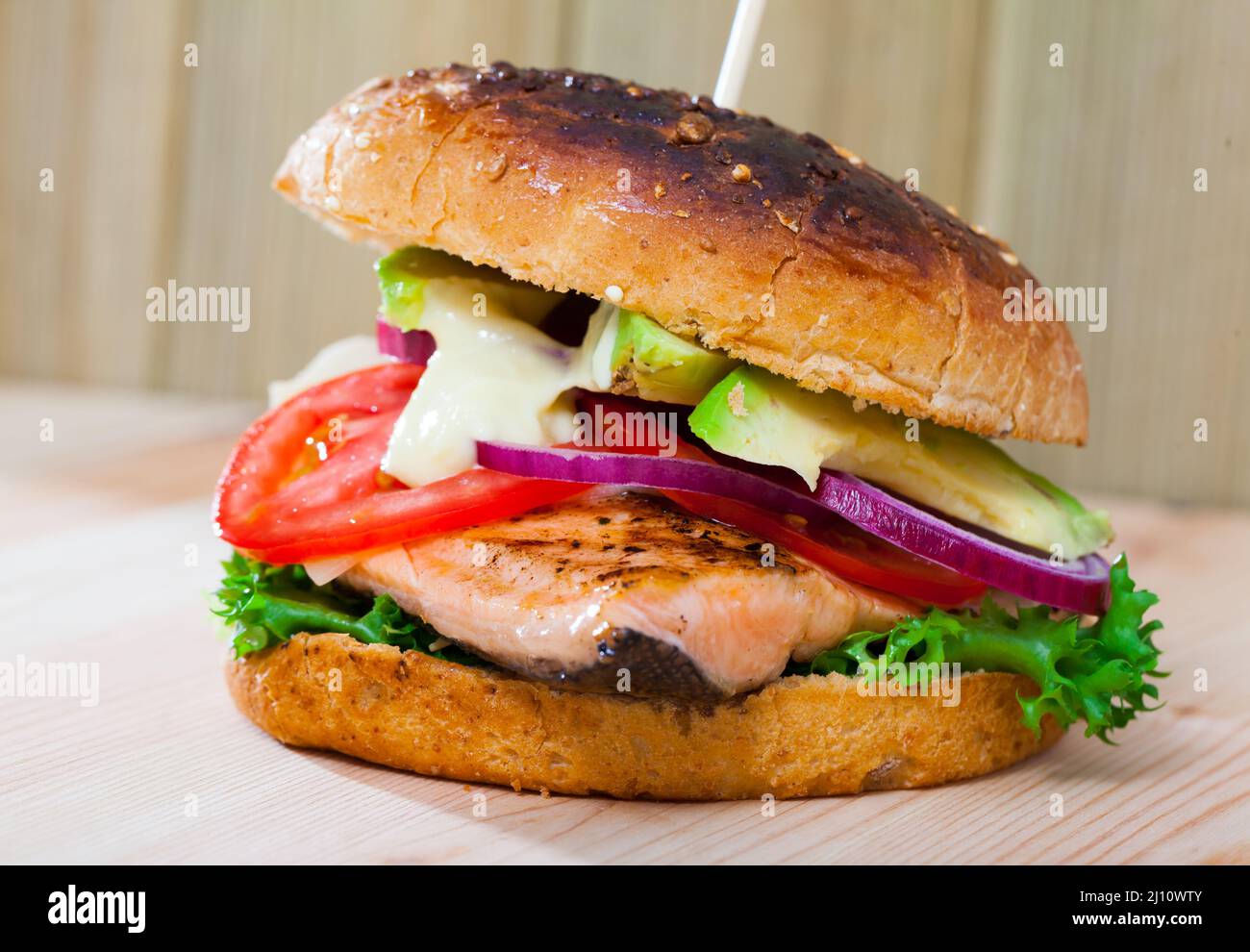 Burger with trout fillets Stock Photo - Alamy