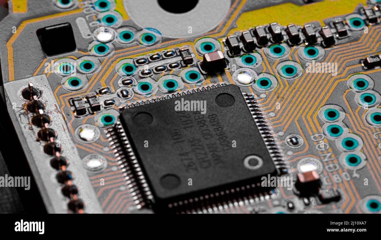 Macro Close up of printed wiring and components on PC circuit board ...
