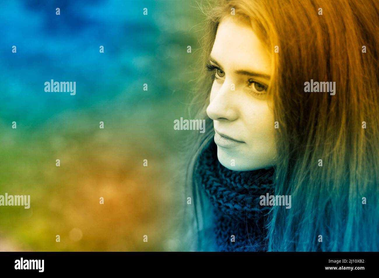 brunette teenager girl portrait in split color Stock Photo - Alamy