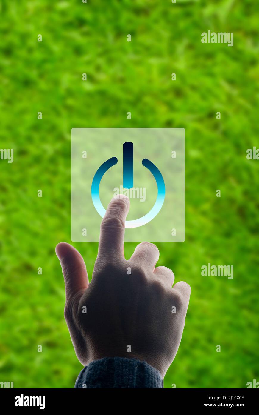 hand pushing a button ON green transition concept Stock Photo - Alamy