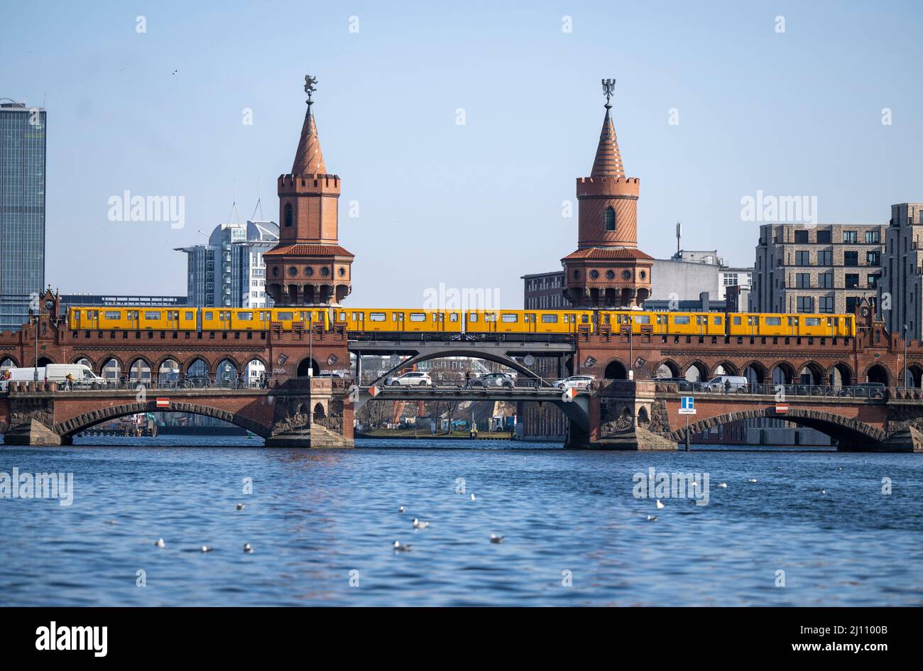 Berlin, Germany. 21st Mar, 2022. A BVG subway train crosses the ...