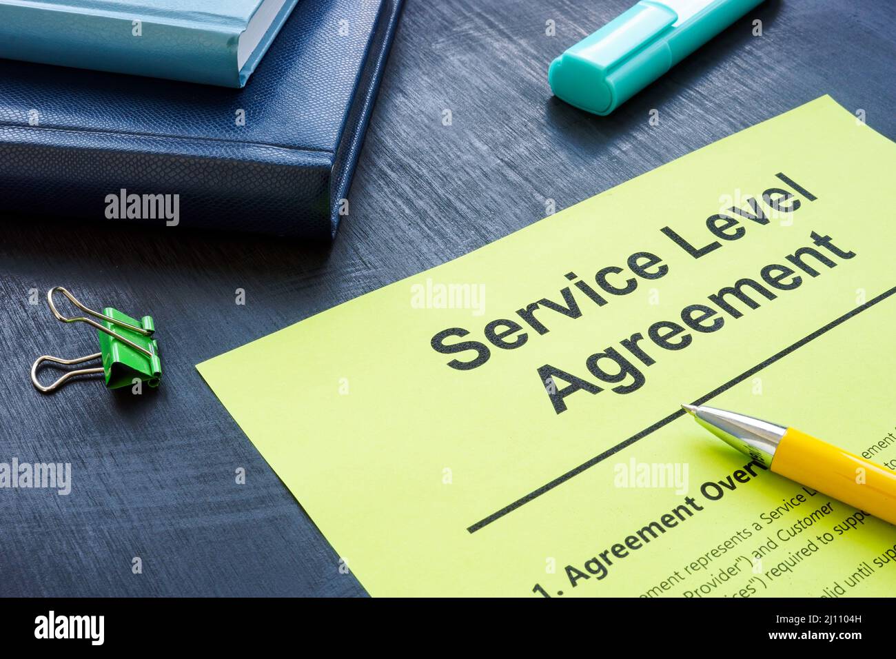 Service level agreement form for signing and pen Stock Photo - Alamy