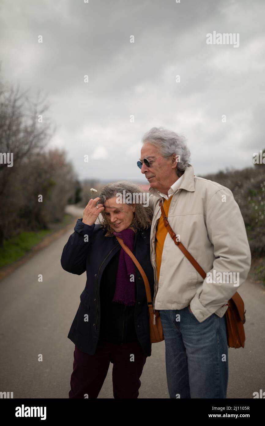 A couple, man and woman, retired couple, 60 and 70 years old, with gray ...