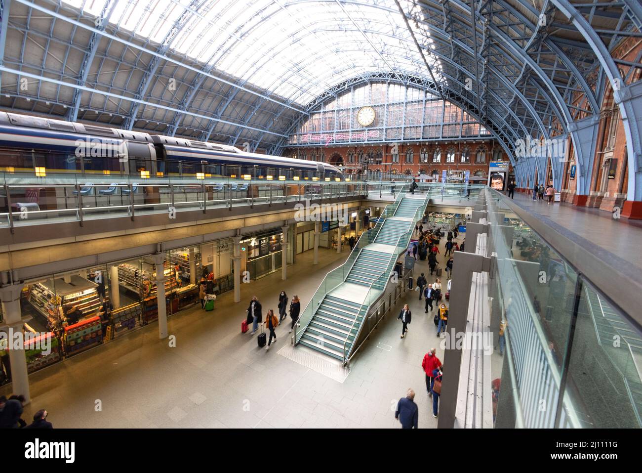 St Pancras station concourse London with train, shops and people, St ...