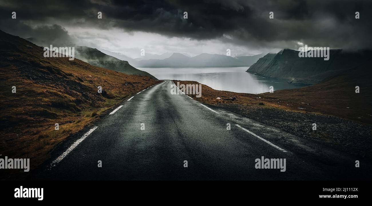 View of countryside road near sea during trip roaming the curvy roads ...