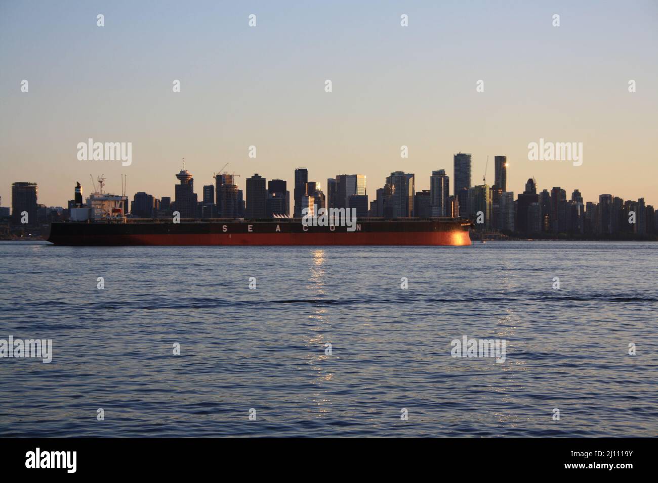 Oil tanker seen at Burrard Inlet, with Vancouver downtown as background ...