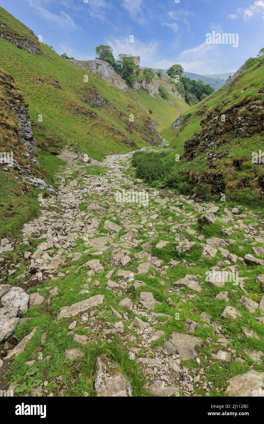 Peveril Castle on the hillside in Cave Dale (or Cavedale), a dry ...