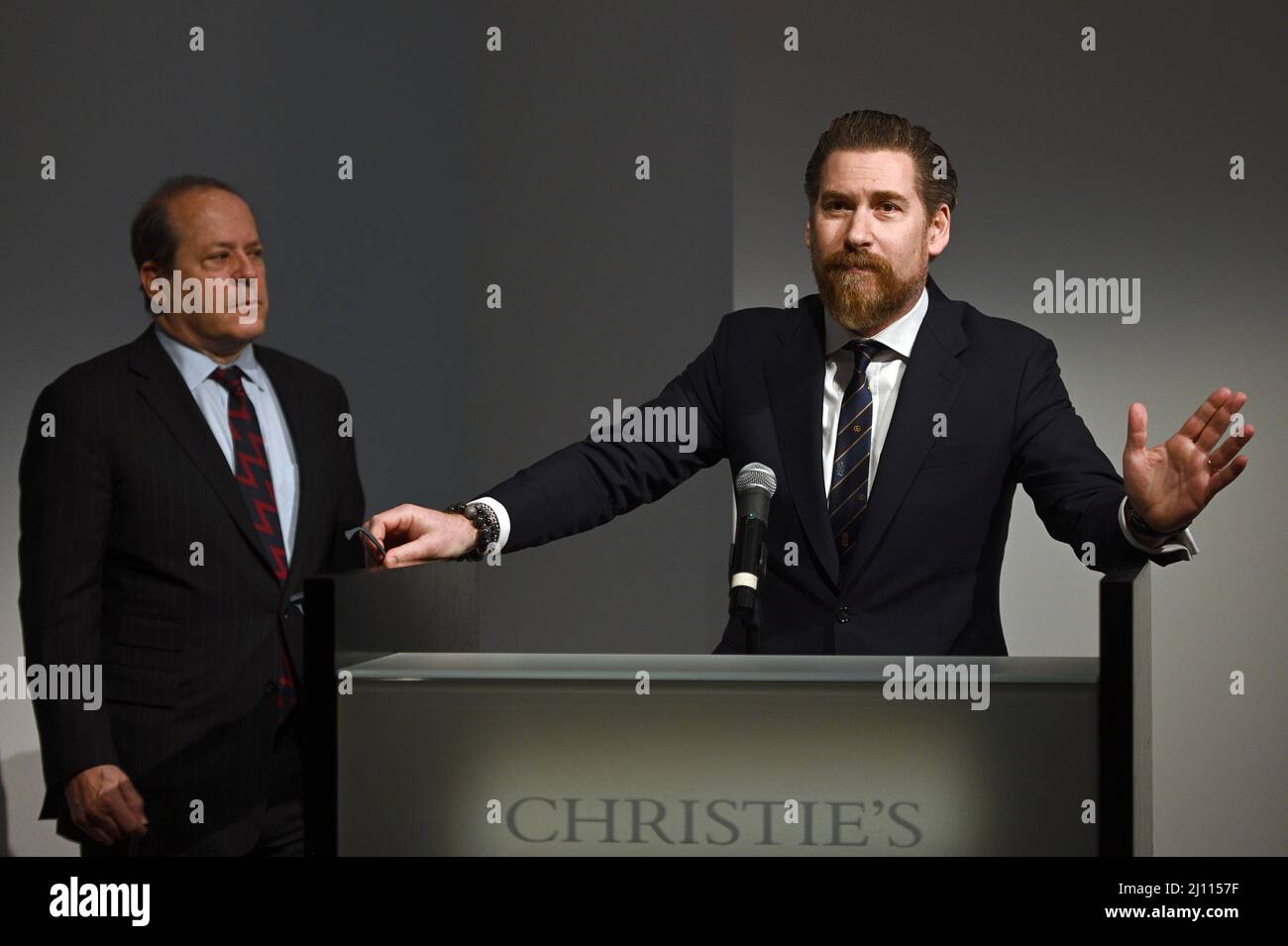 Christie’s Americas chairman Marc Porter (L) looks on as Christie's ...