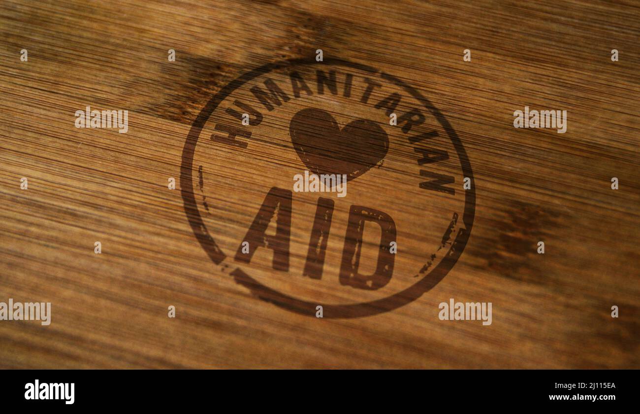 Humanitarian Aid stamp printed on wooden box. Help refugees ...