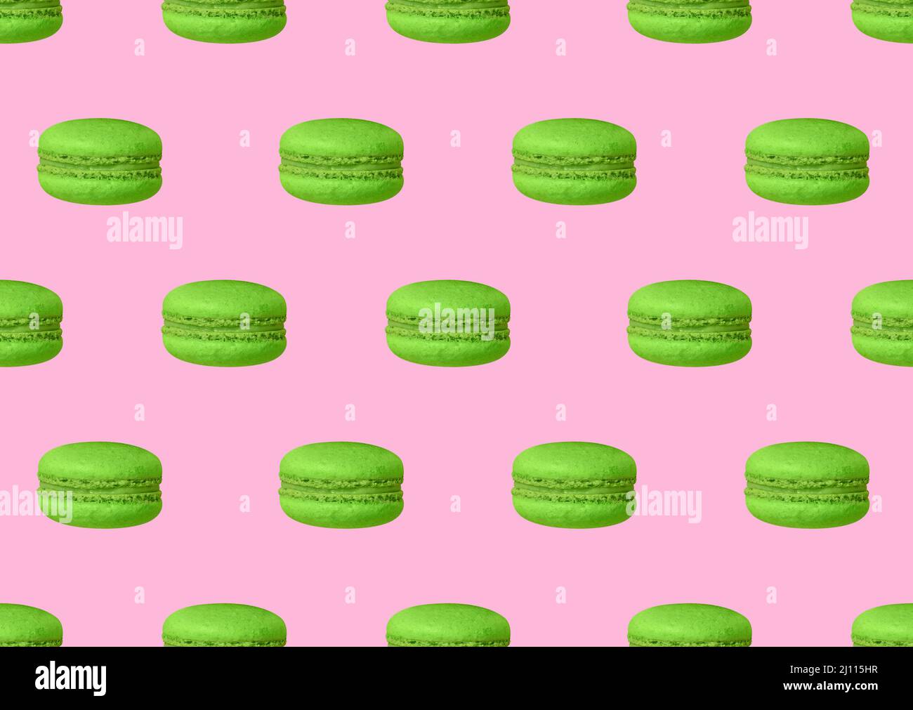 Bright green french biscuits on pink backdrop Stock Photo - Alamy