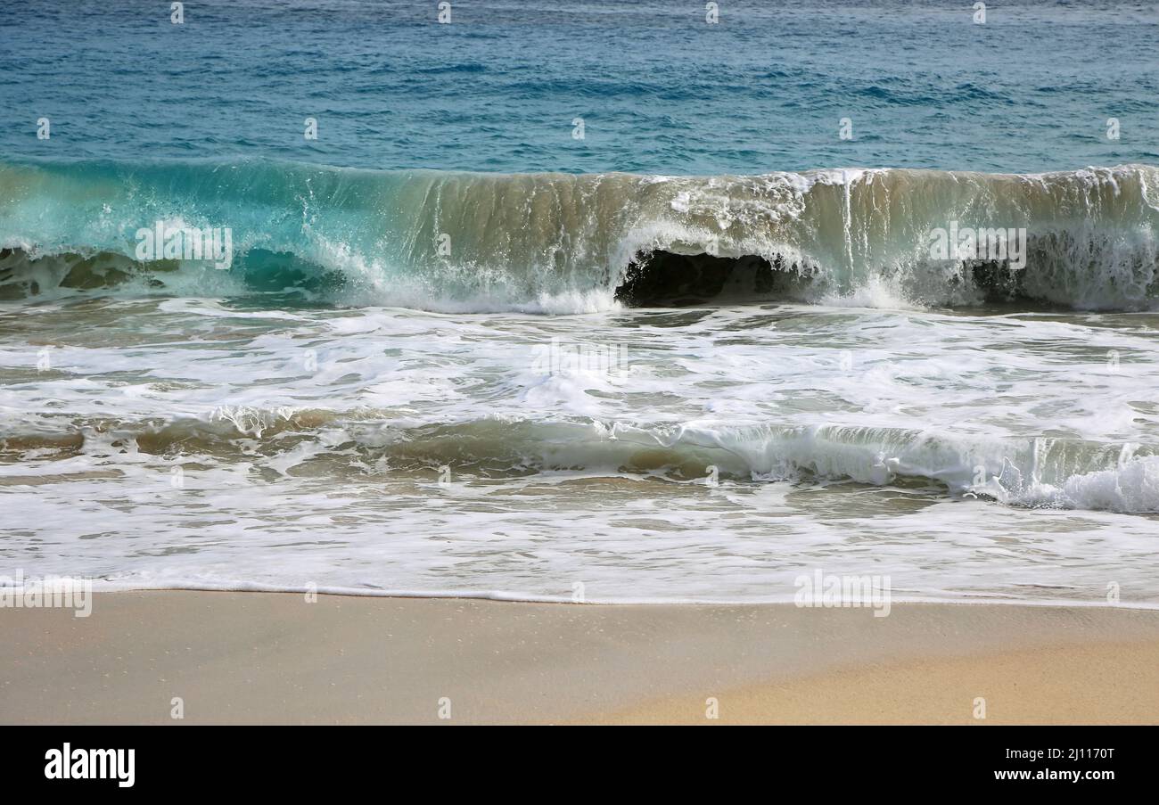 Sandy wave - Hawaii Stock Photo - Alamy
