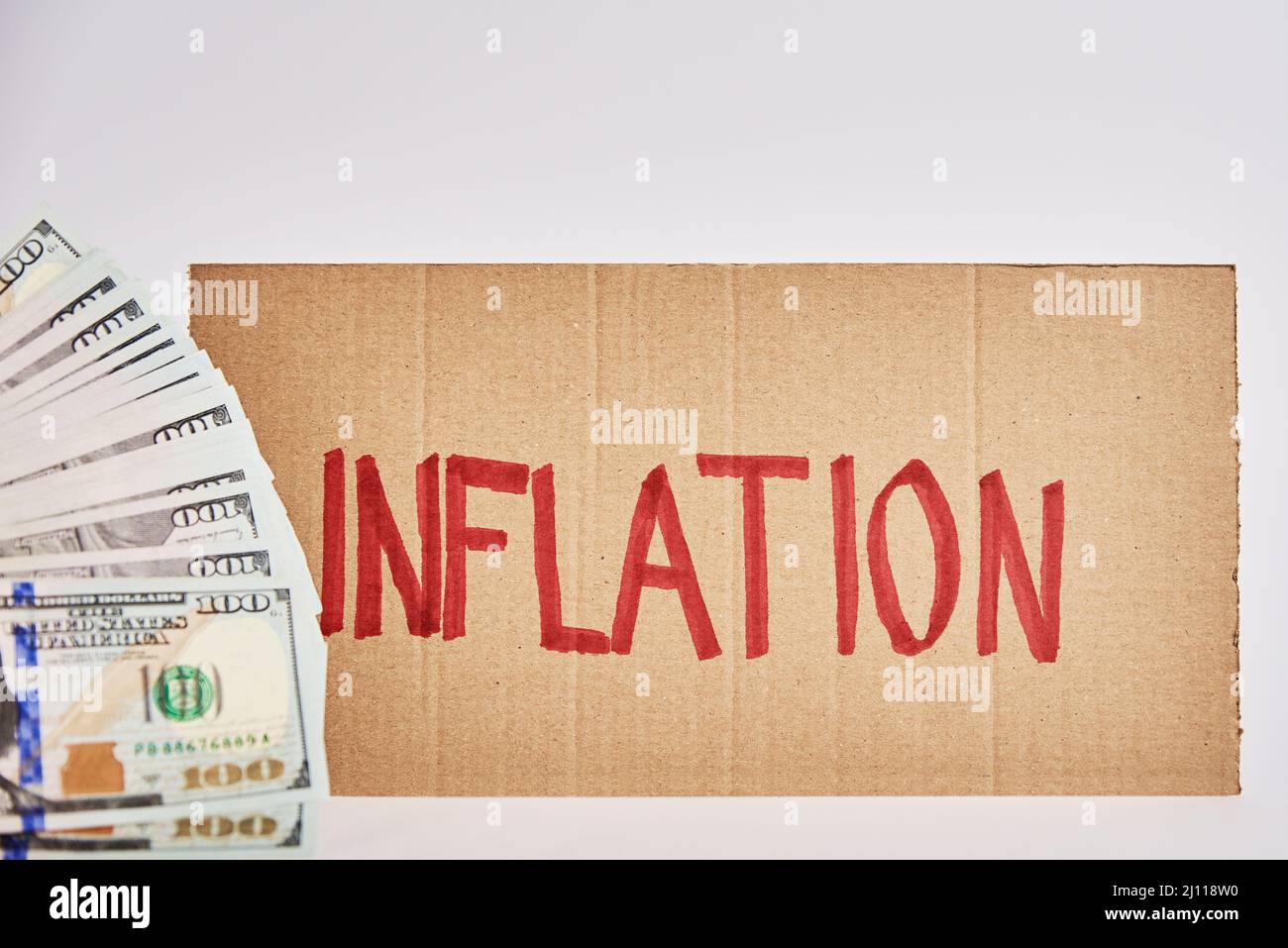 World economic crisis and inflation concept, Cardboard sheet with word ...