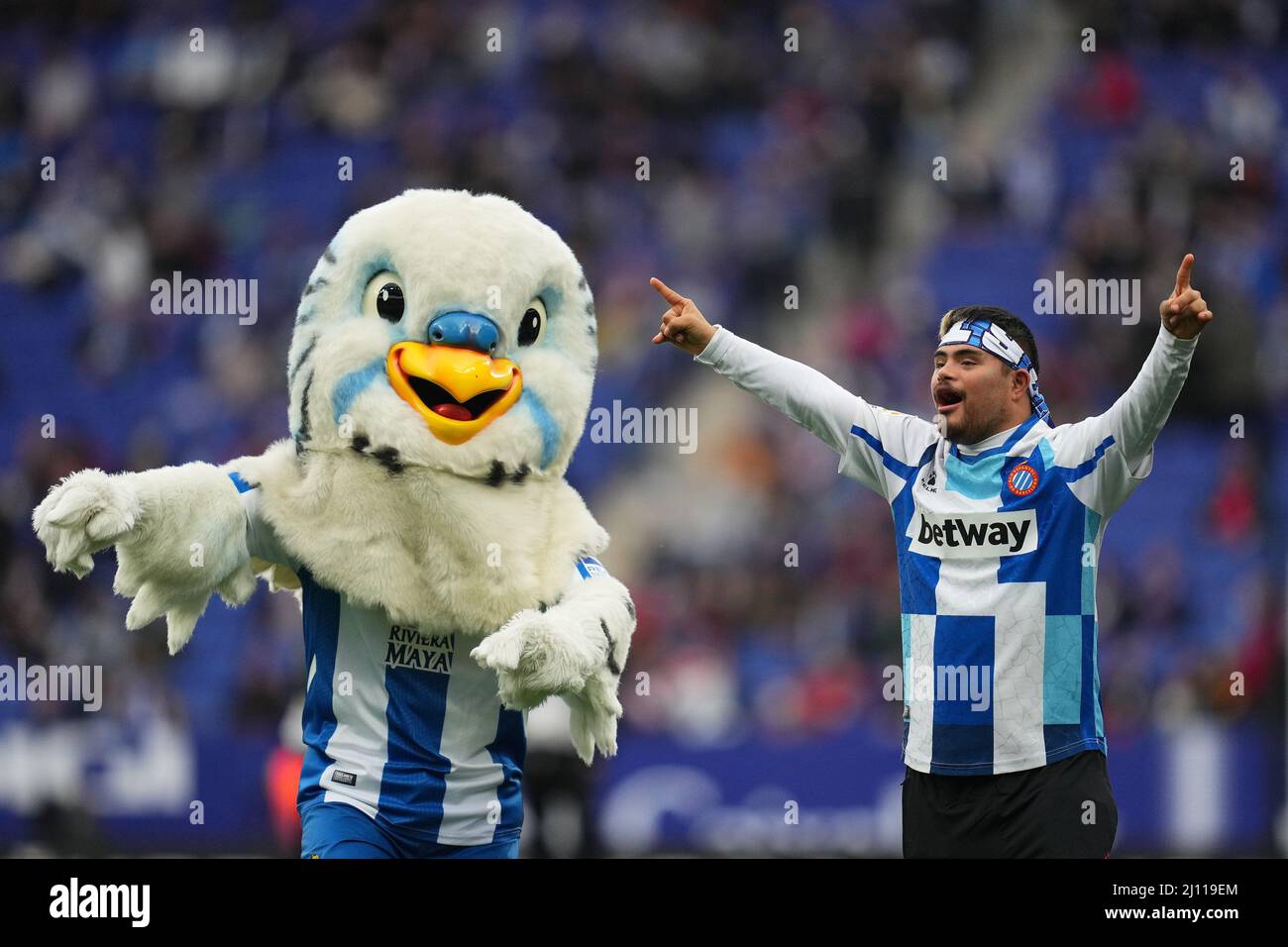 RCD Espanyol fan dancing with the mascot during the La Liga match ...